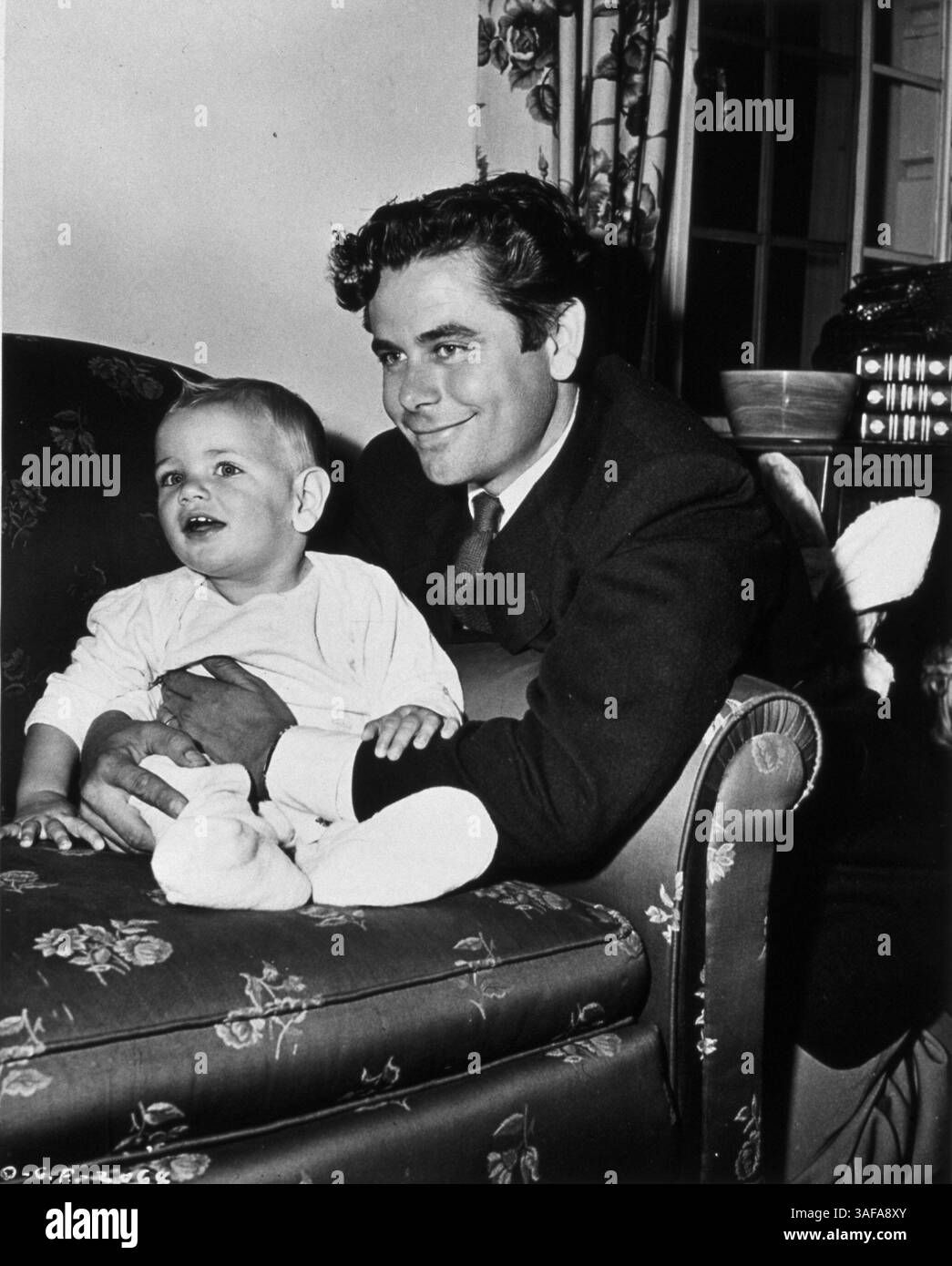 Jun 01, 1946; Hollywood, California, USA; 1946, Pictured: FAMILIES (REAL), GLENN FORD, PETER ...