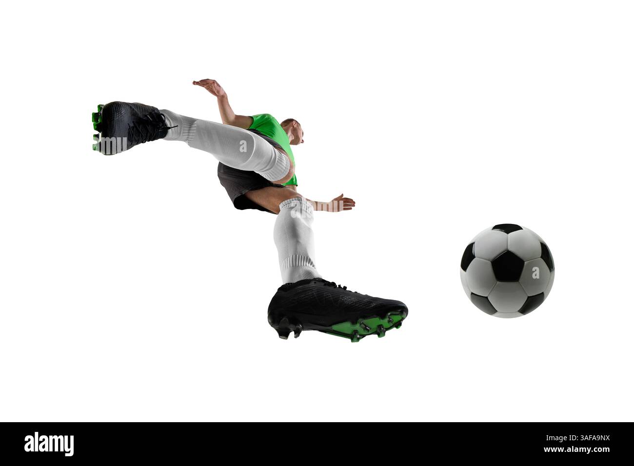 Low angle of powerful man, dressed sport uniform, soccer player turning ...