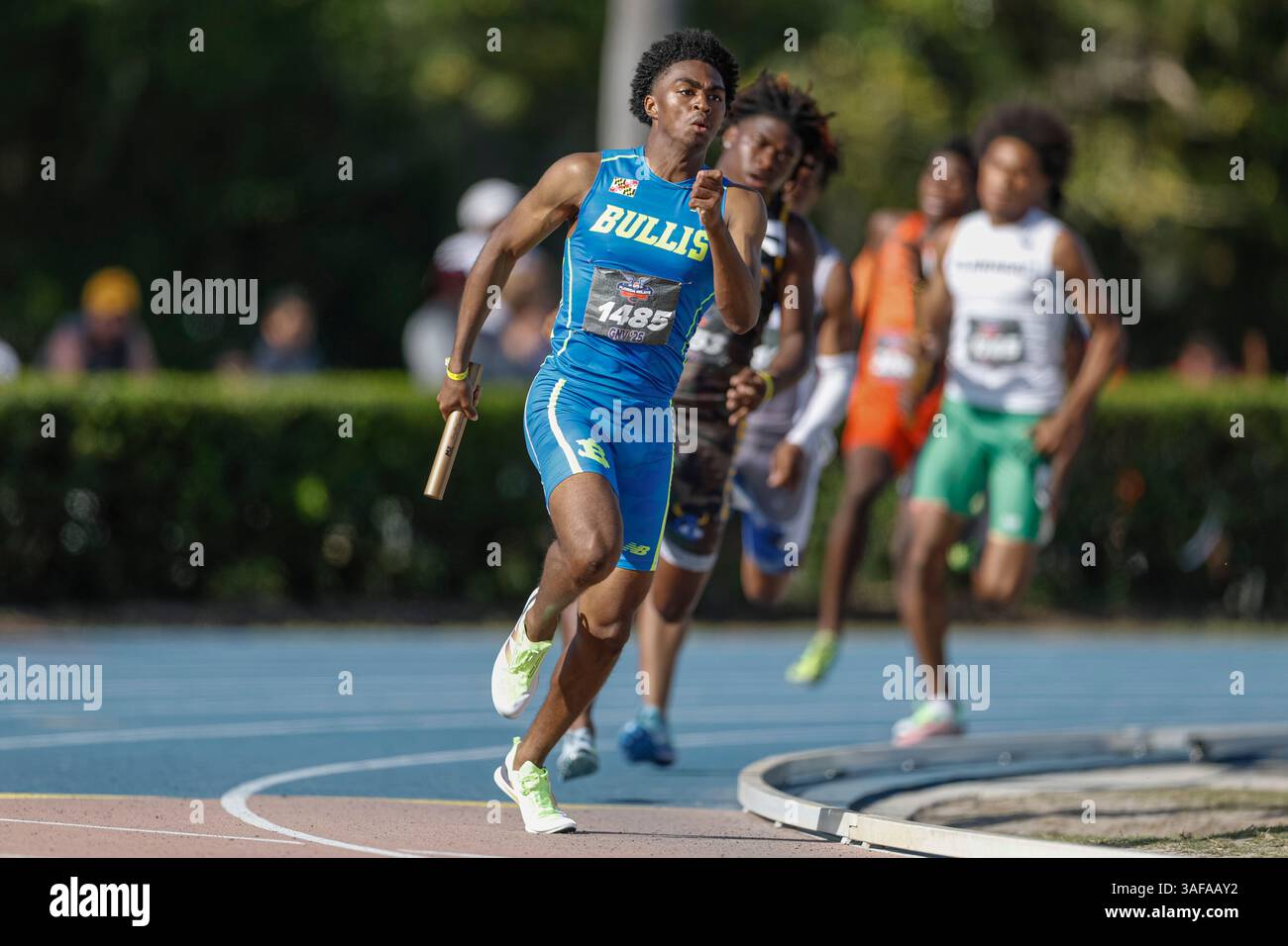 Gainesville, FL. USA; Alexander Lambert of Bullis High School continues ...