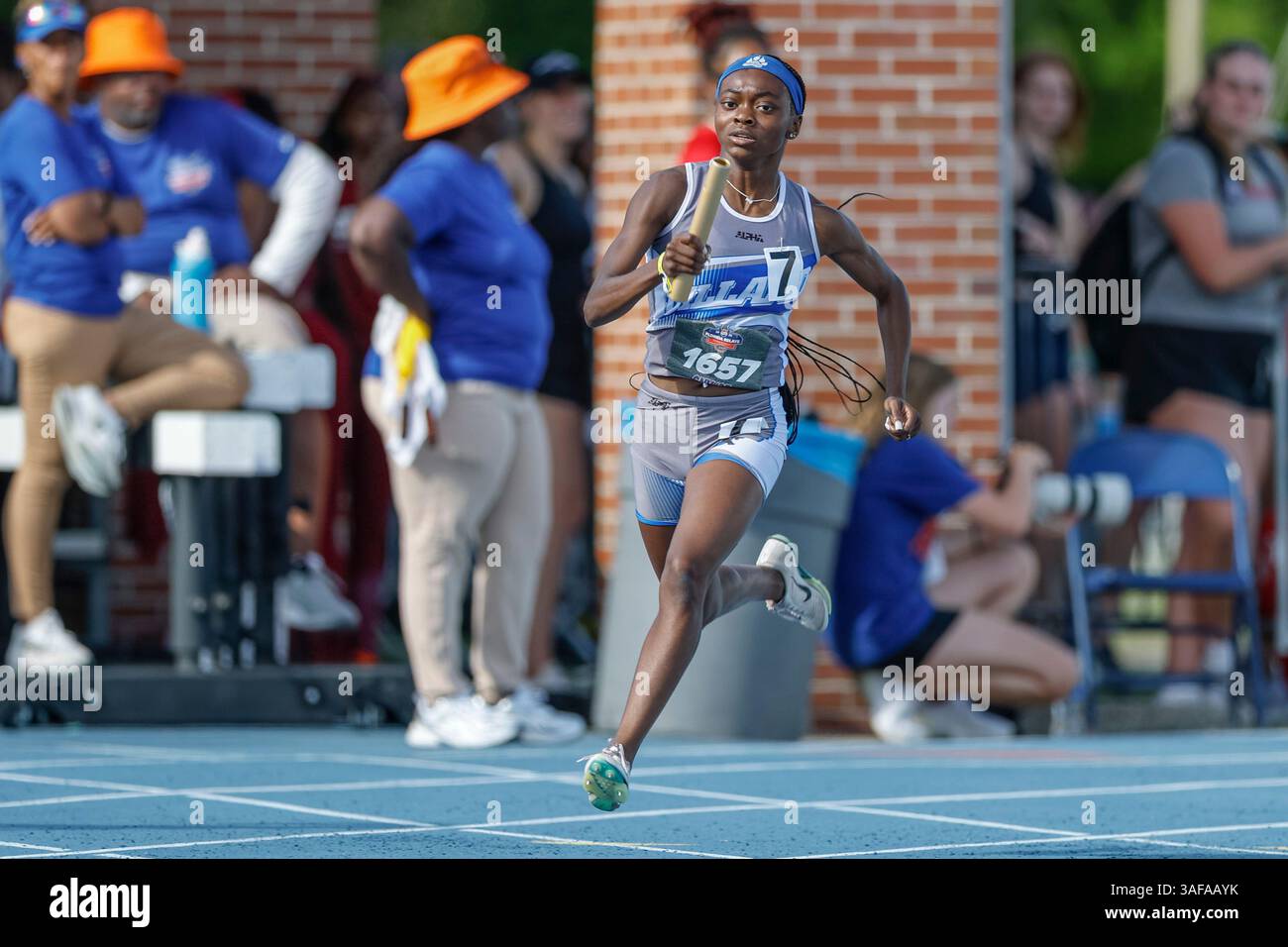 Gainesville, FL. USA; Shynah Collins of Dillard High School runs in the ...