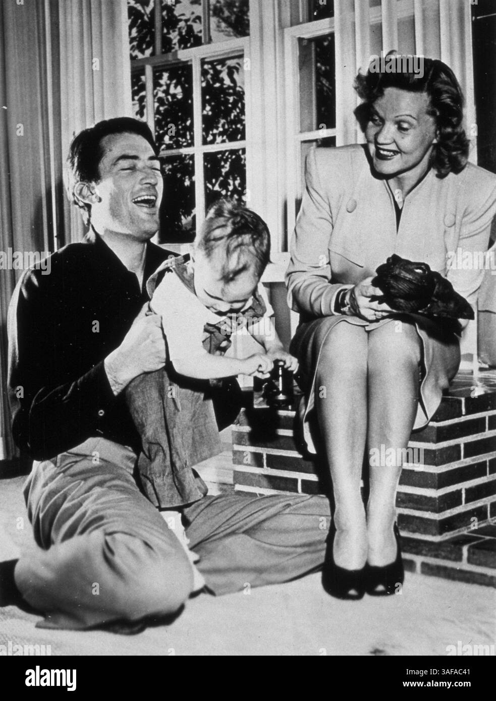 Jun 01, 1945; Hollywood, California, USA; 1945, Pictured: FAMILIES (REAL), GREGORY PECK ...