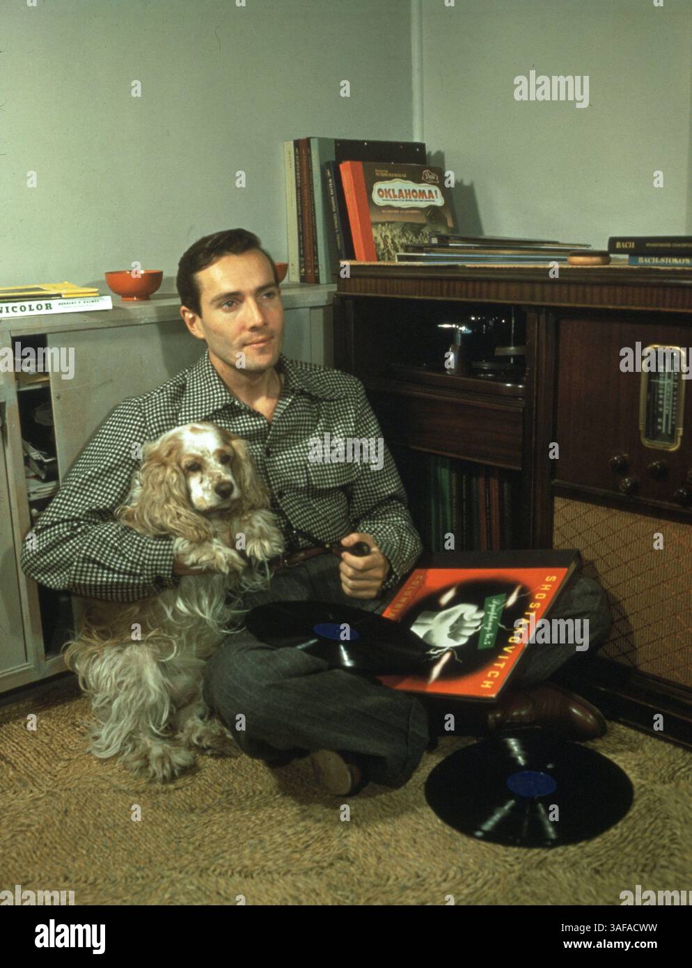 1947, Pictured: HURD HATFIELD, ANIMALS (WITH ACTORS), DOG. (Credit ...