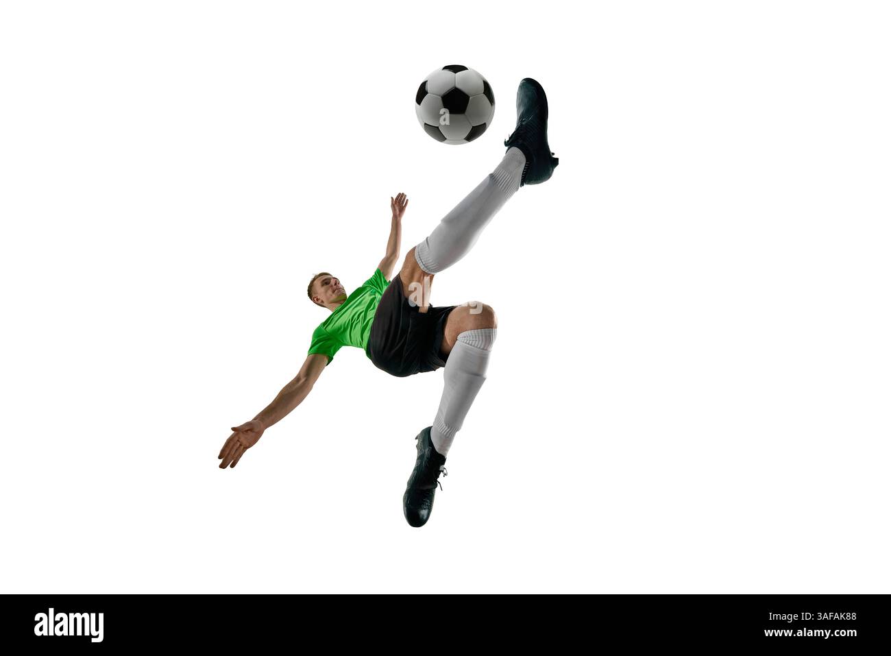Low angle of strong man, dressed sport uniform, soccer player leaping ...