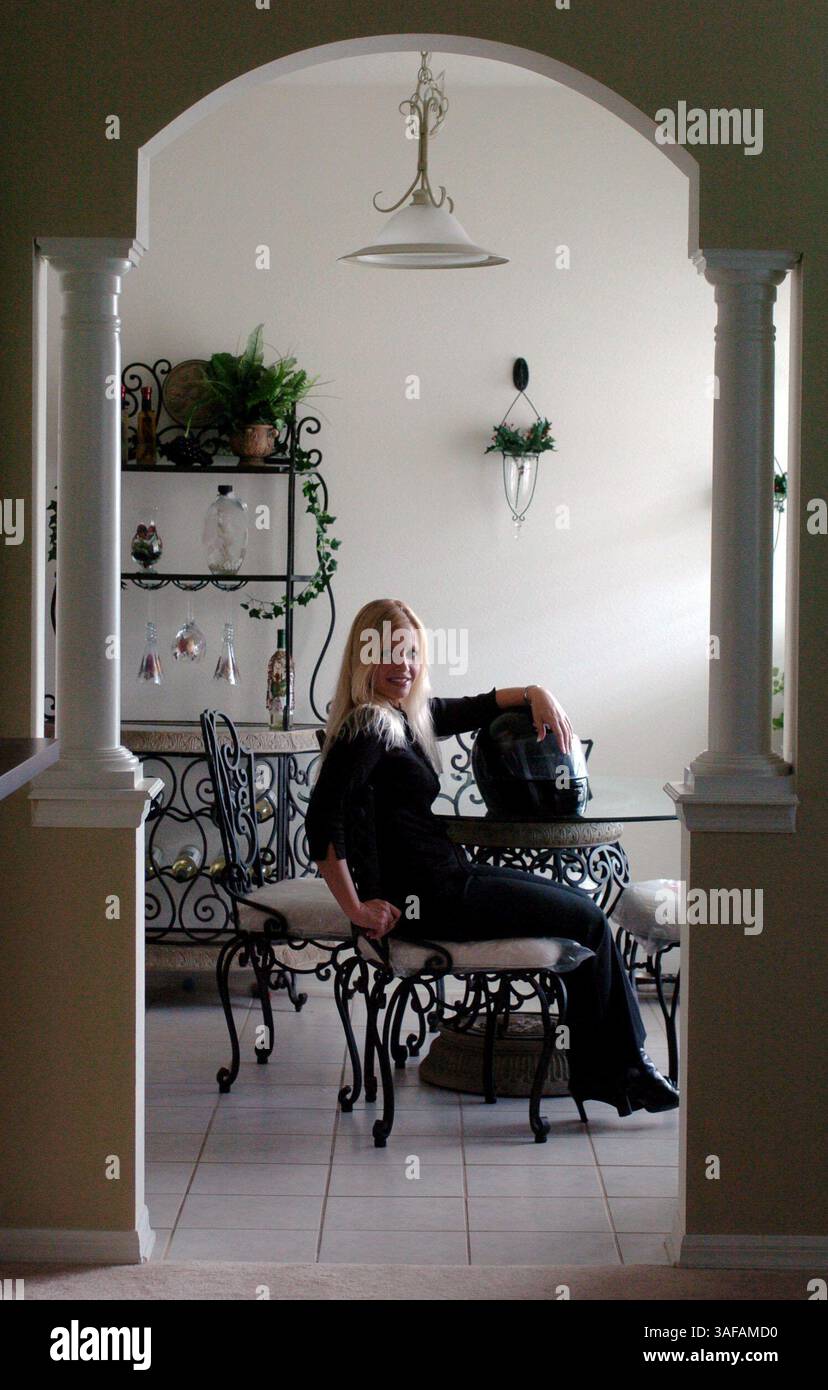 CAPTION 3 : (Wesley Chapel - 08/24/2005) .Amber Fleming (cq) poses for ...