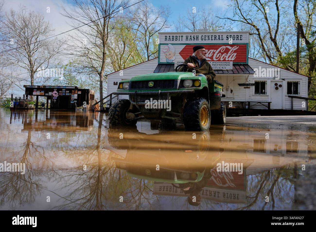 Dale Bardes, the oldest resident of Rabbit Hash, Ky., drives on the ...
