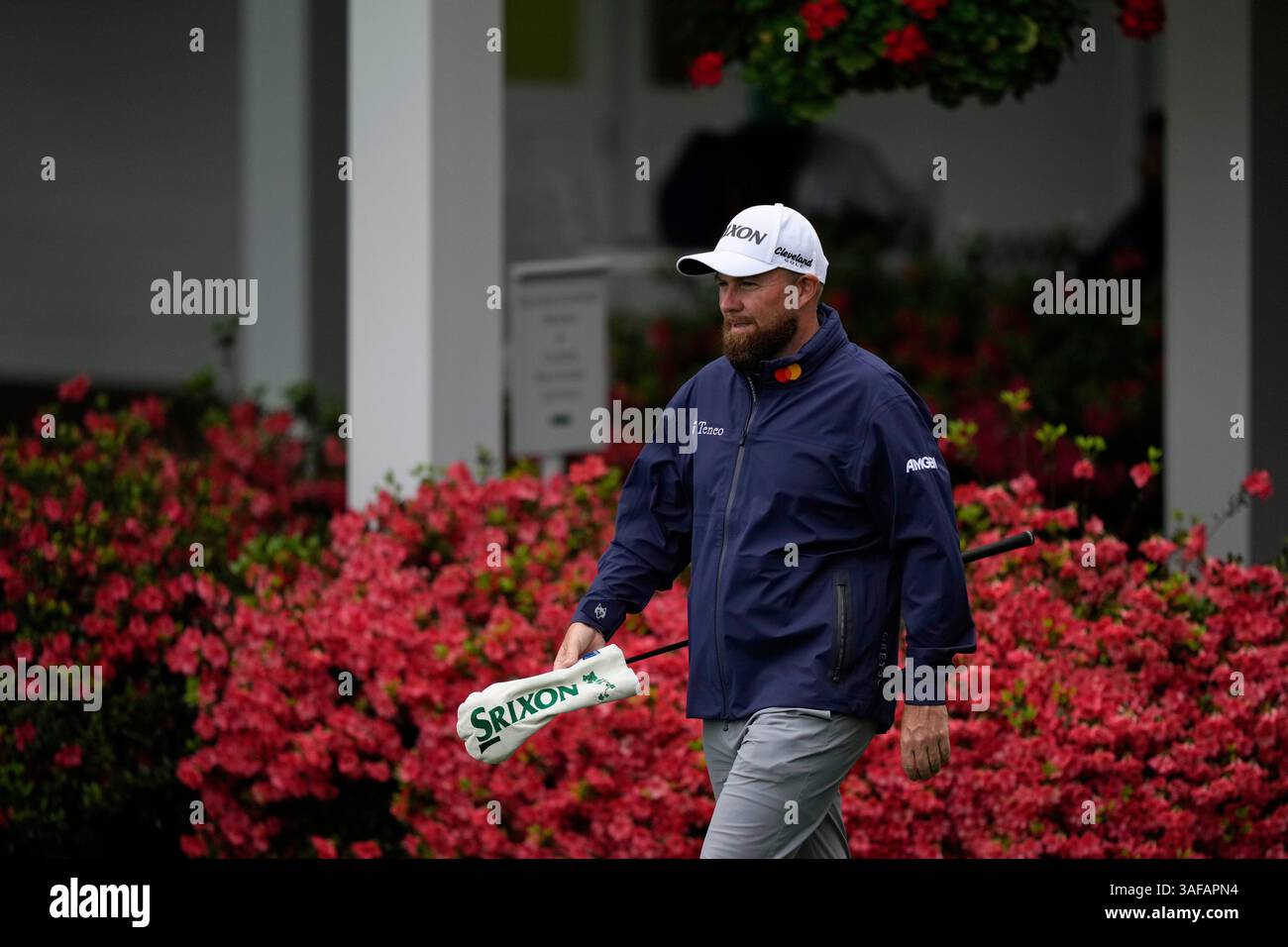 Shane Lowry, of Ireland, walks to the driving range during a practice ...