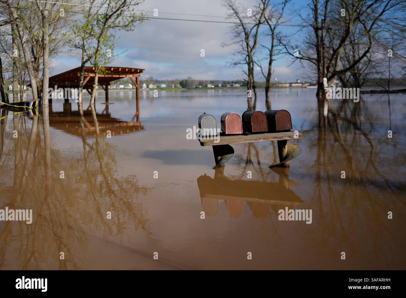 The rising Ohio River floods along Lower River Road, Monday, April 7, 2025, in Rabbit Hash, Ky ...