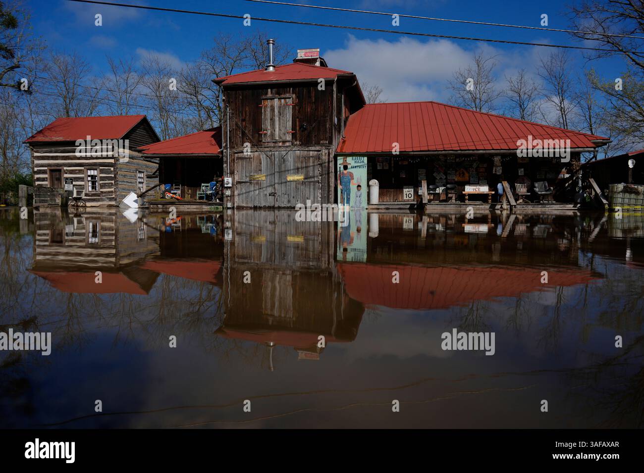 The rising Ohio River floods along Lower River Road, Monday, April 7, 2025, in Rabbit Hash, Ky ...