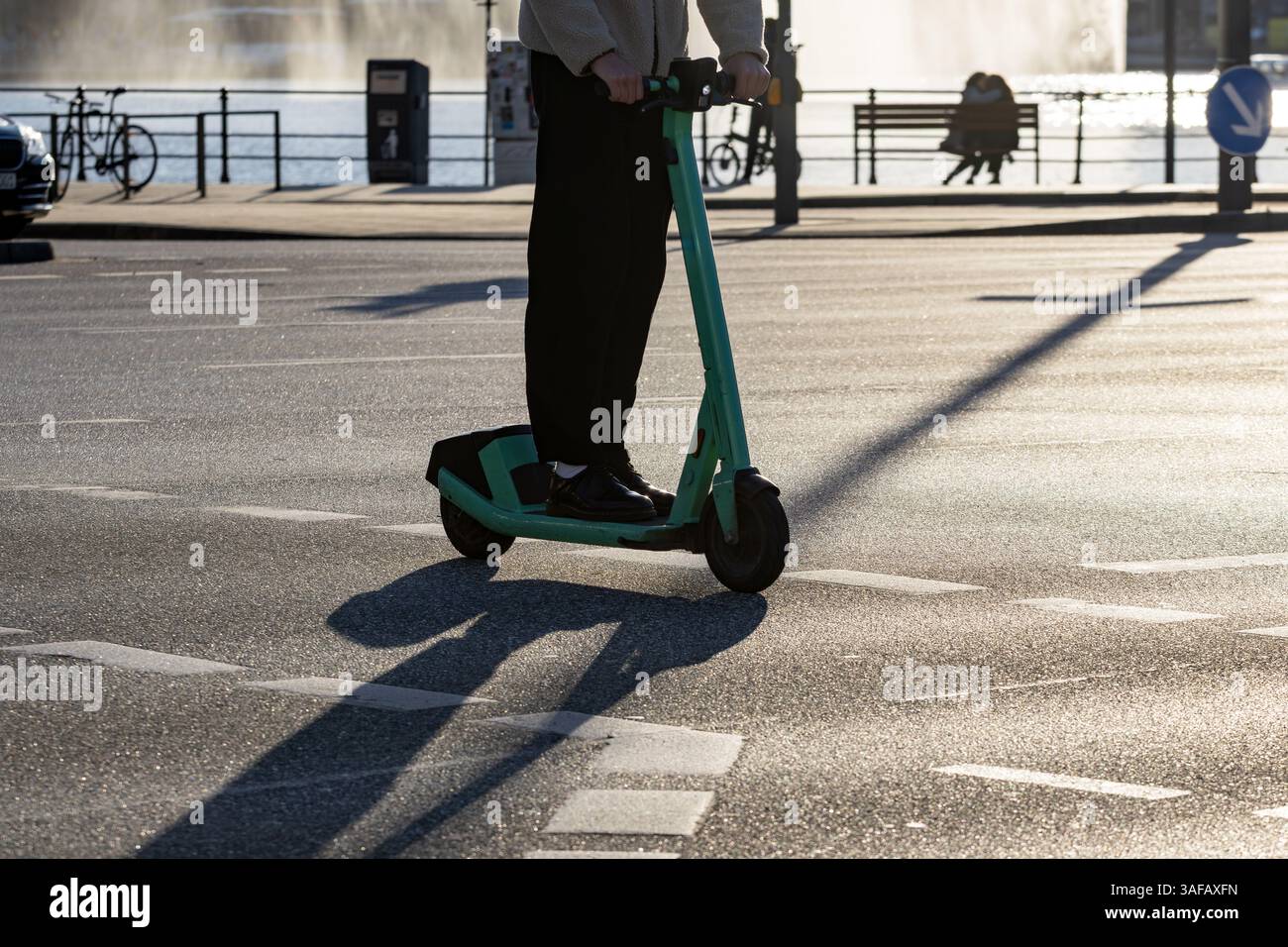 Man on electric scooter ride hi-res stock photography and images - Alamy