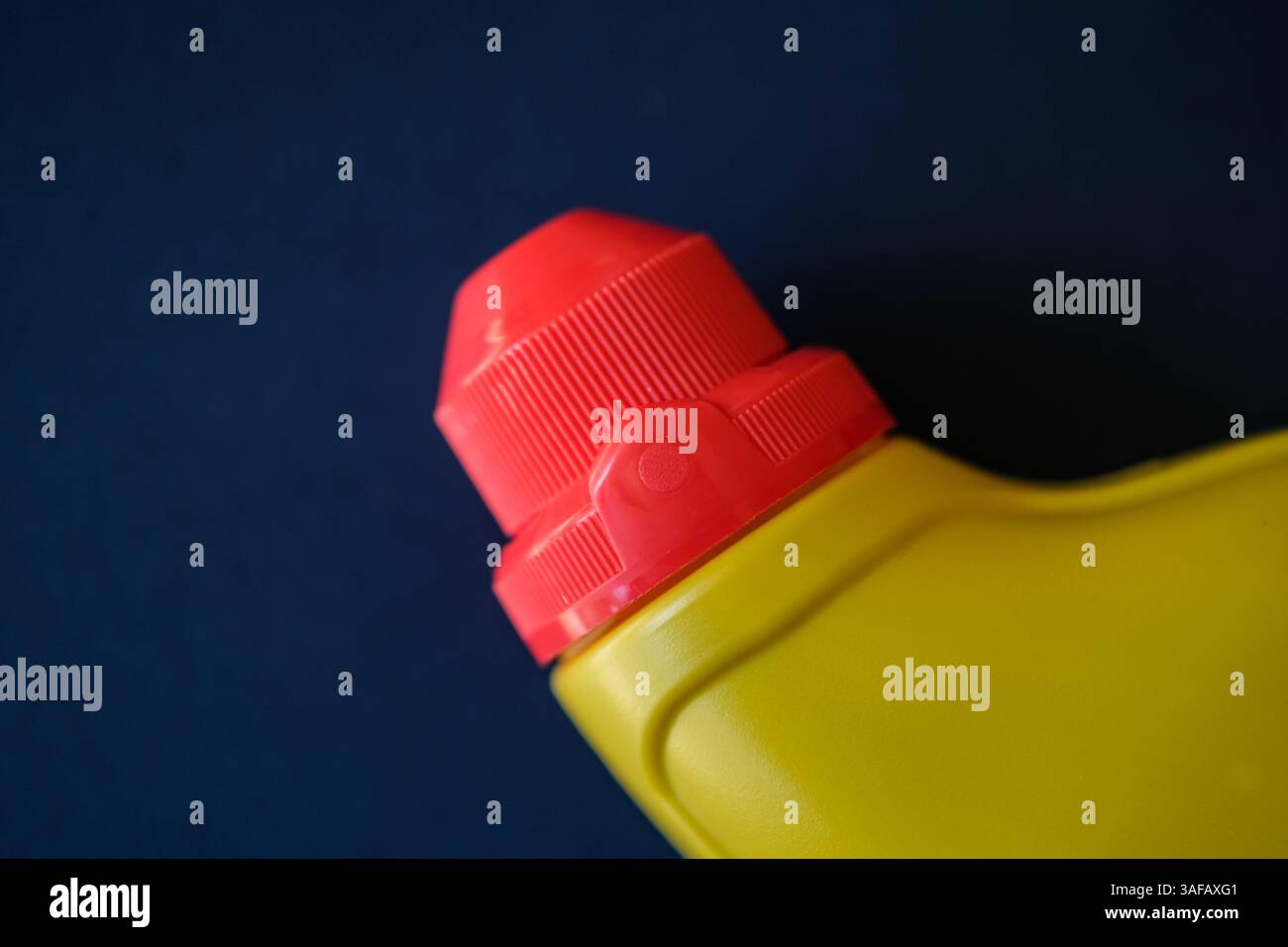 London UK, April 07 2025, Abstract Of Red Top On A Yellow Plastic ...