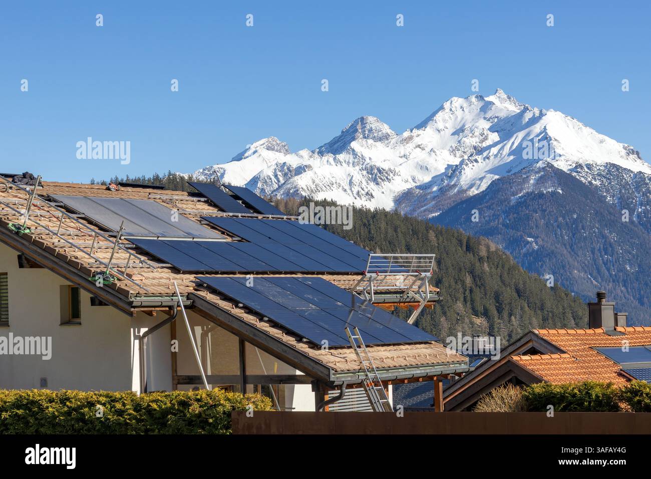 Solar modules are installed on a Swiss roof Stock Photo - Alamy