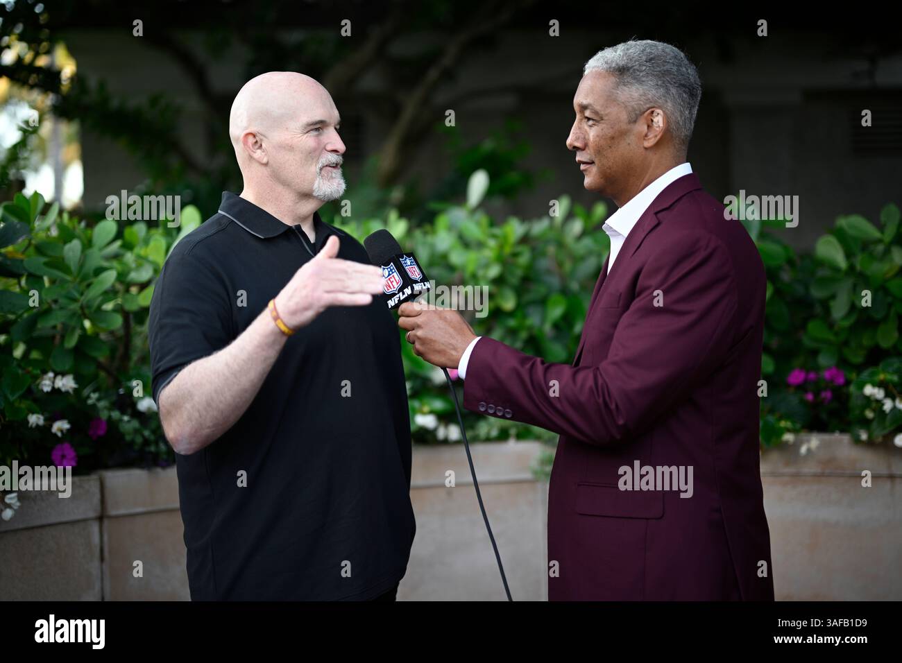 Washington Commanders head football coach Dan Quinn is interviewed by ...