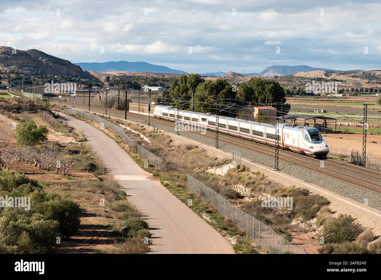 Renfe high speed train (AVE) in the countryside Stock Photo - Alamy