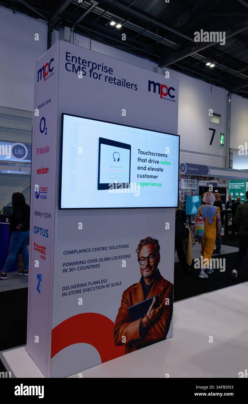 Exhibitors and visitors on stands at the Retail Technology show, ExCel ...