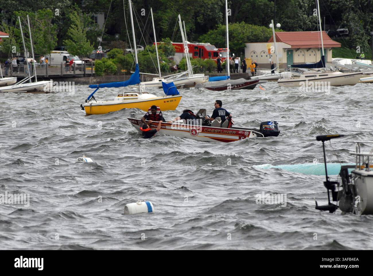 Wind storm water rescue lake calhoun hi-res stock photography and ...