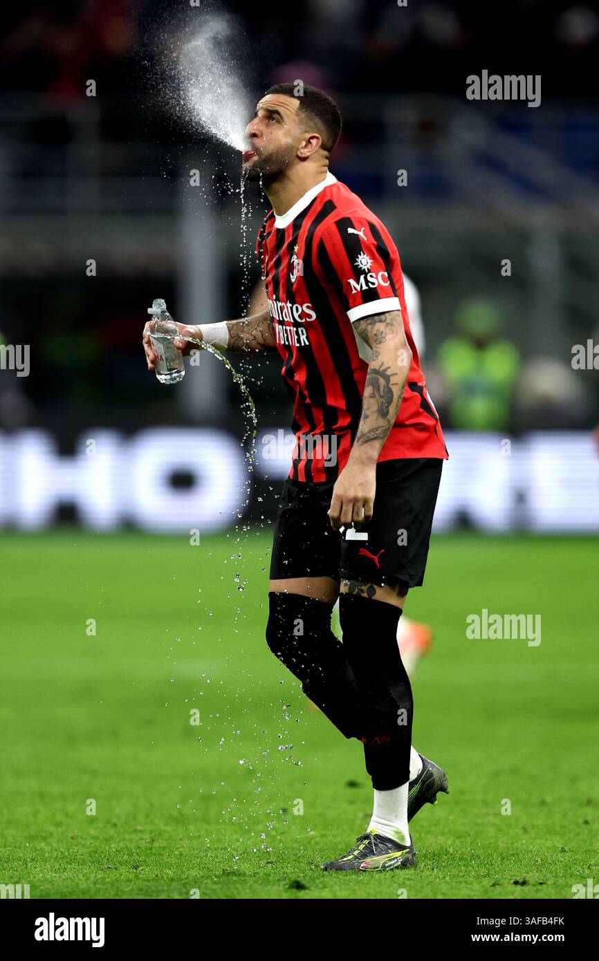 Kyle Walker of Ac Milan spits water from his mouth during the Serie A ...