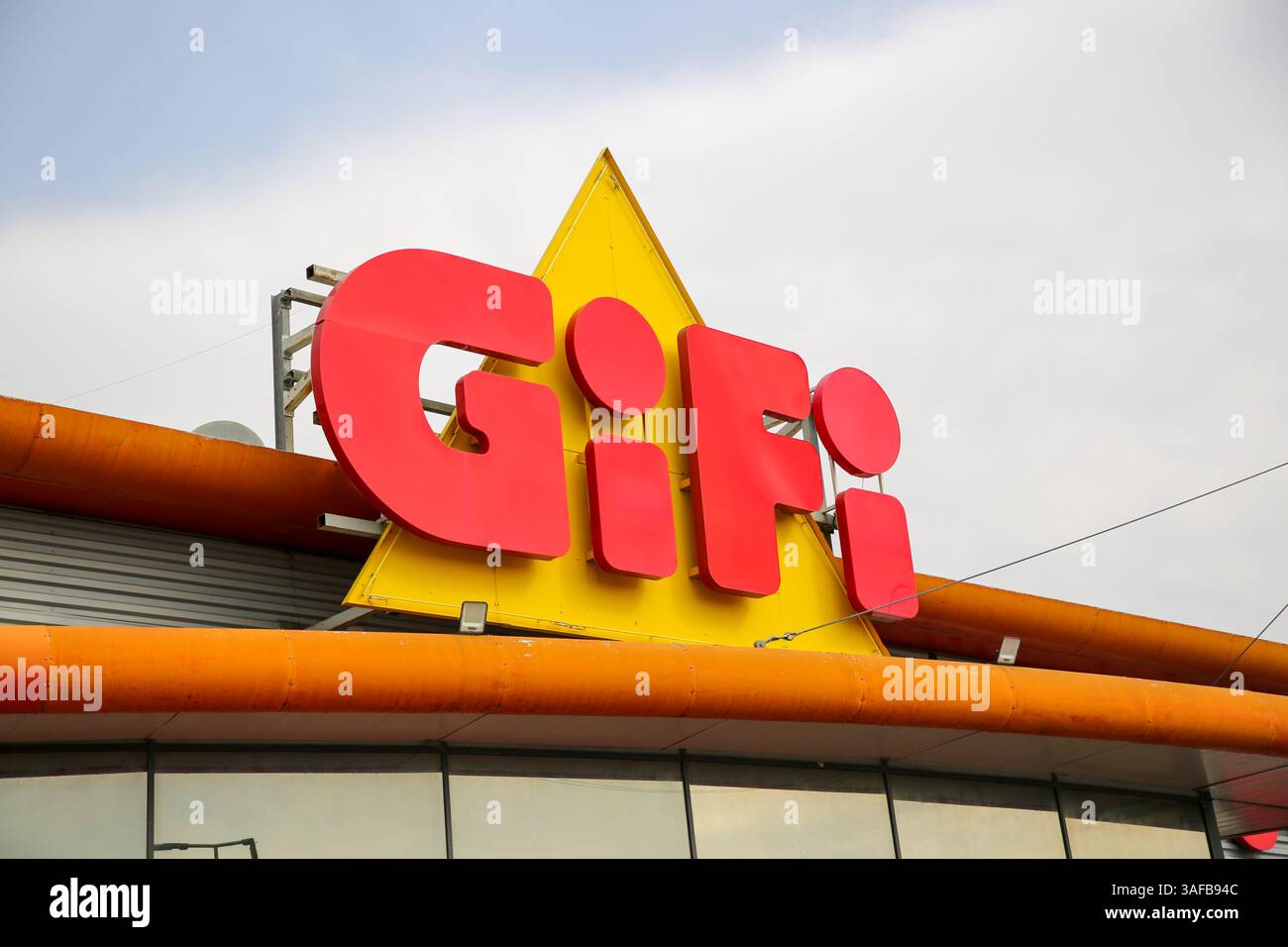 In this photo illustration, the Gifi logo seen displayed on its store ...