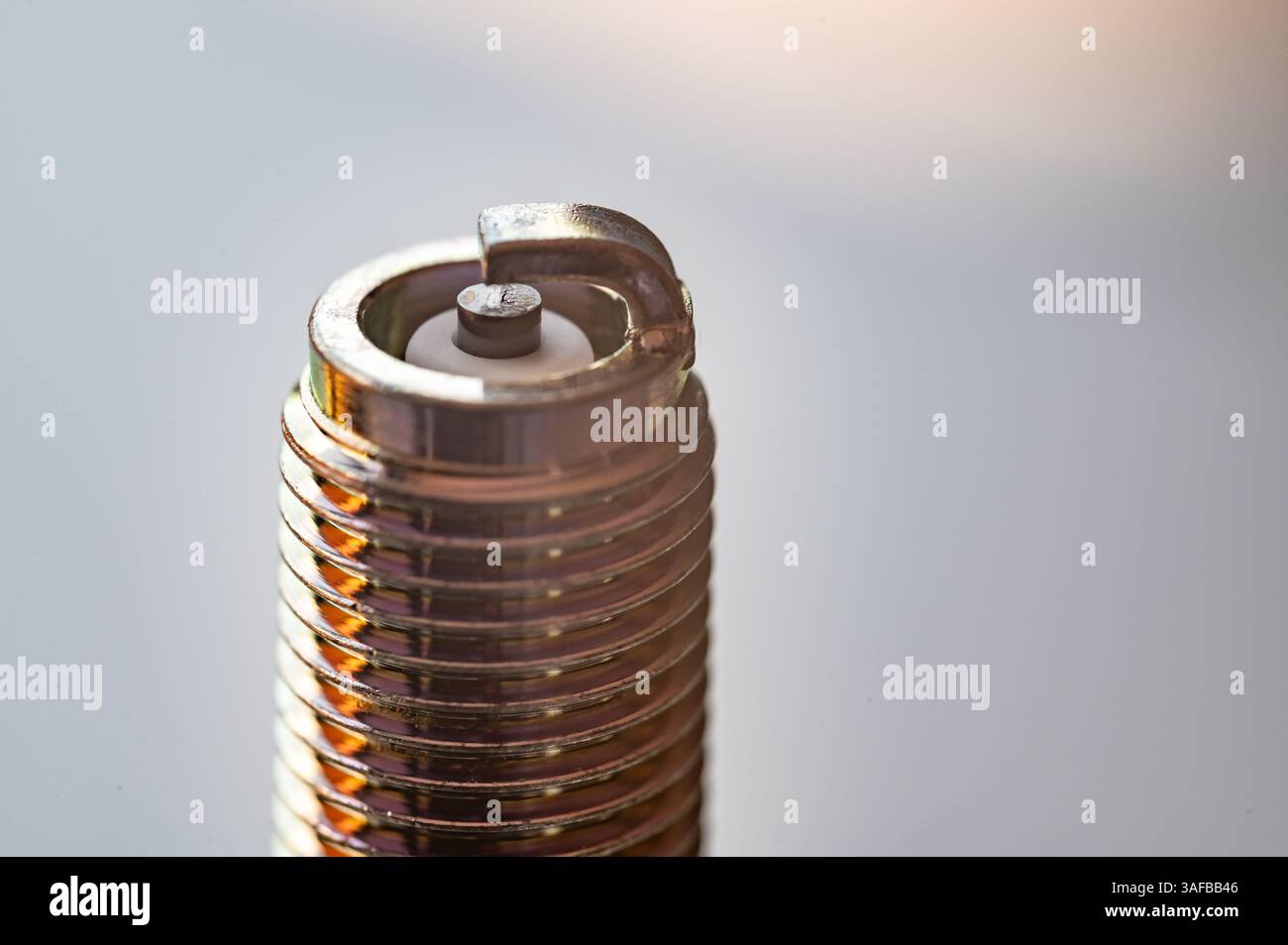 New spark plug for internal combustion engine. Maintenance and care of ...