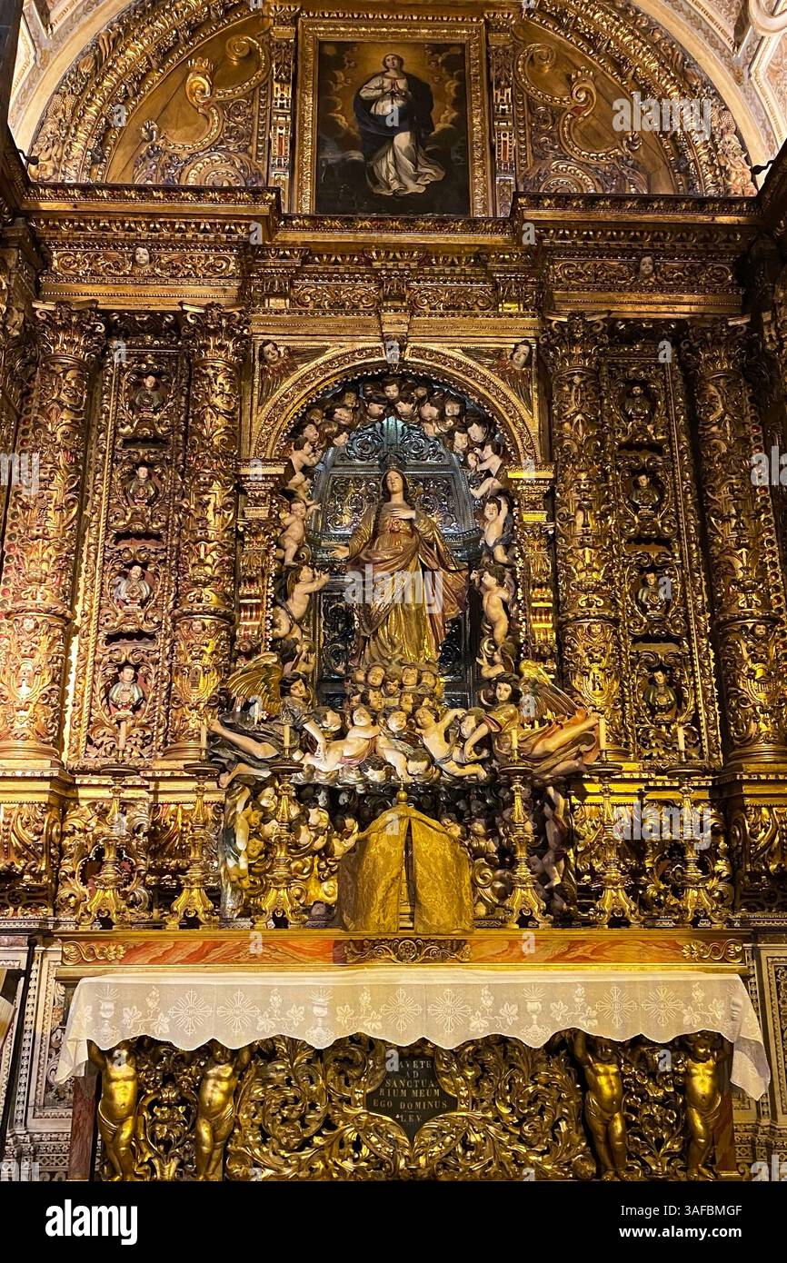 Ornate golden altar in a Catholic church, rich in intricate details ...