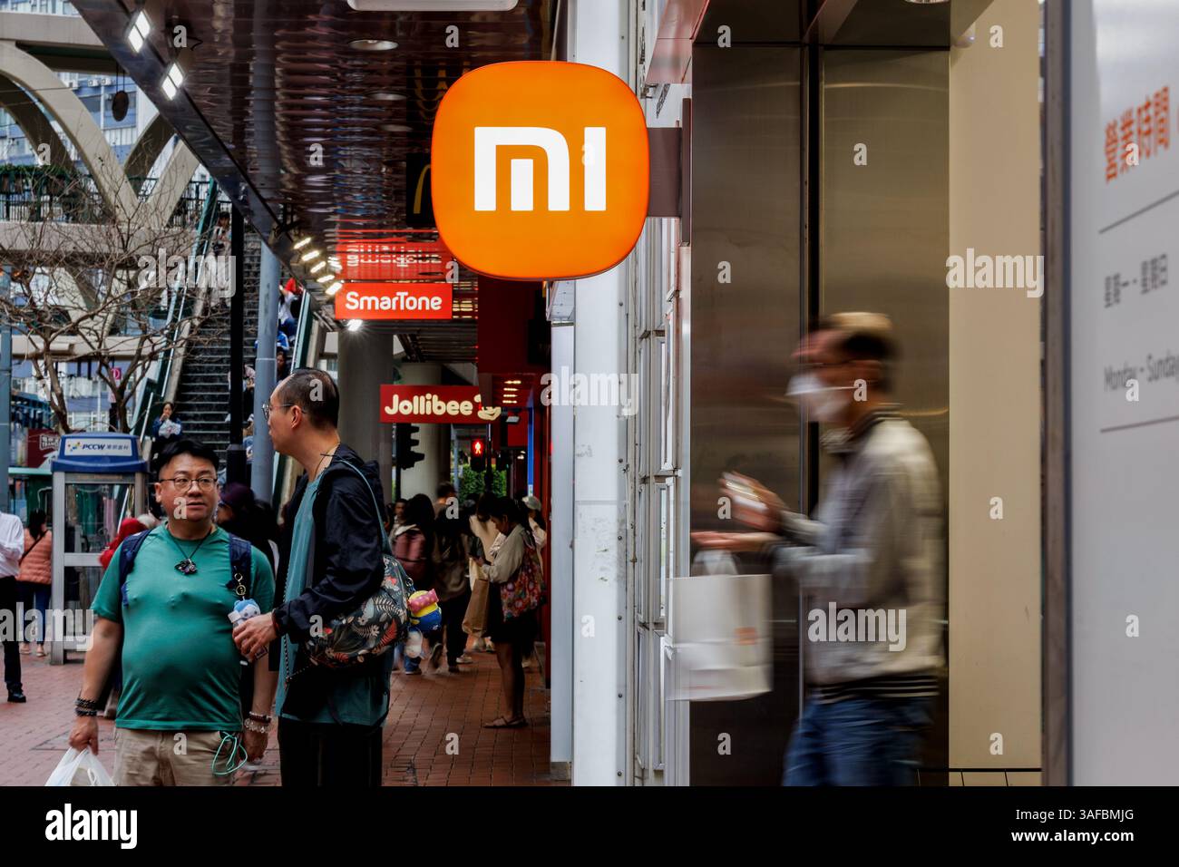 Hong Kong, China. 06th Apr, 2025. A customer walks out Xiaomi's store ...