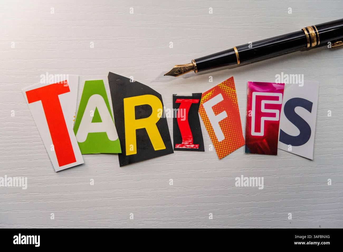 The Word "Tariffs" using cut-out paper letters in the ransom note ...