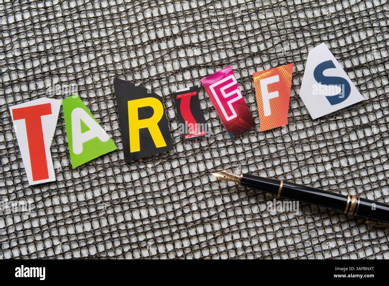 The Word "Tariffs" using cut-out paper letters in the ransom note ...