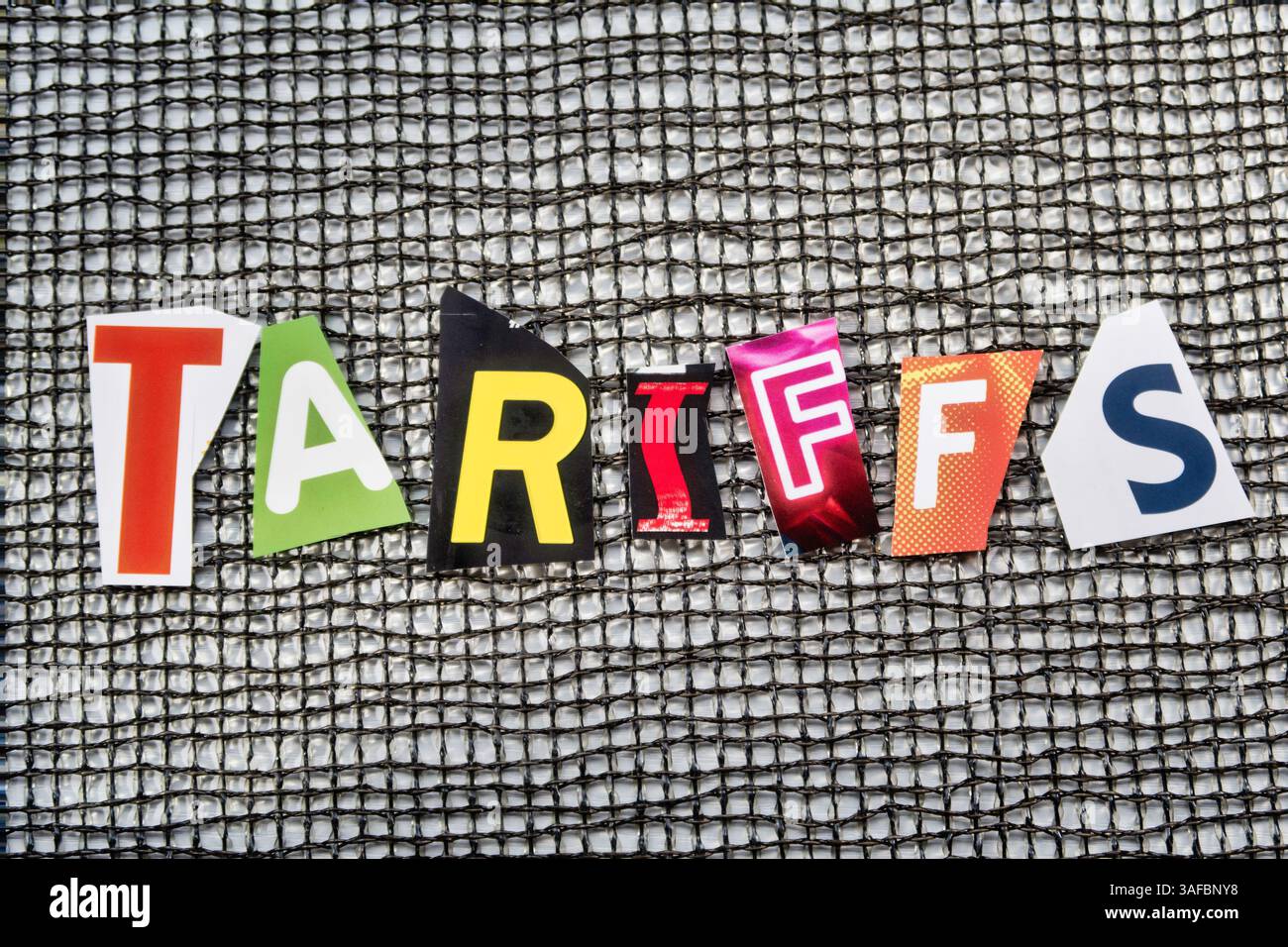 The Word "Tariffs" using cut-out paper letters in the ransom note ...
