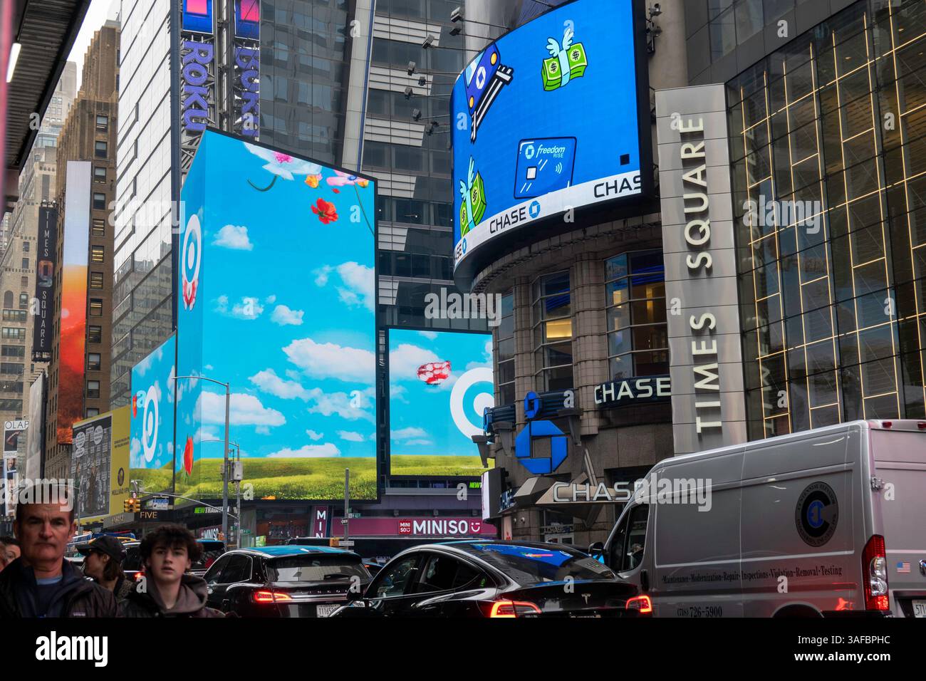 Times Square is brightly lit with electronic billboards, New York City ...