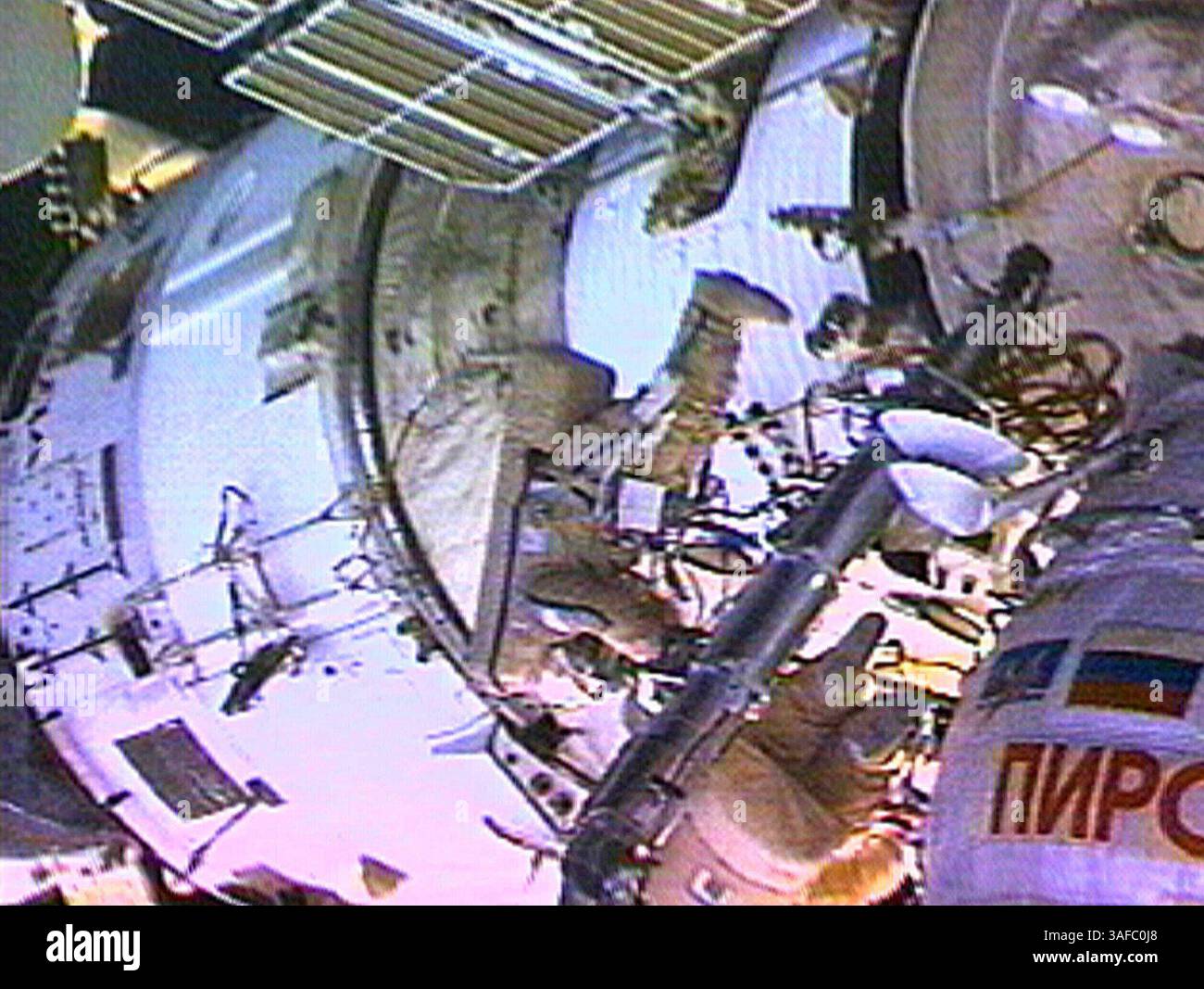 Dec 03, 2001; N/A, In Space; Cosmonaut Mikhail Tyurin takes pictures of ...