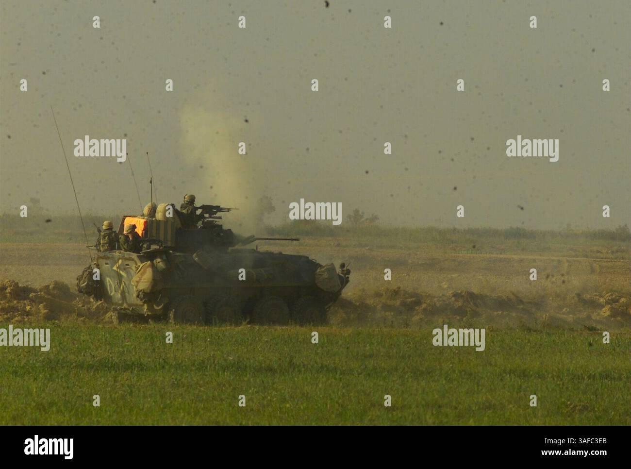Apr 03, 2003; Northern Iraq, Iraq; Light Armored Vehicle 25 shoots its ...