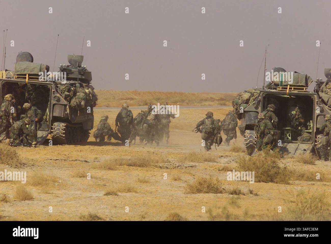 Apr 01, 2003; n/a, Iraq; Marines from Charlie Company, 1st Battalion ...