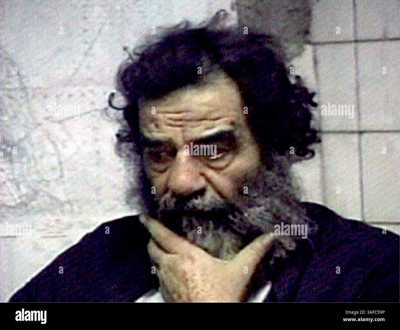 Dec 14, 2003; BAGHDAD, IRAQ; Video image of captured former Iraqi ...