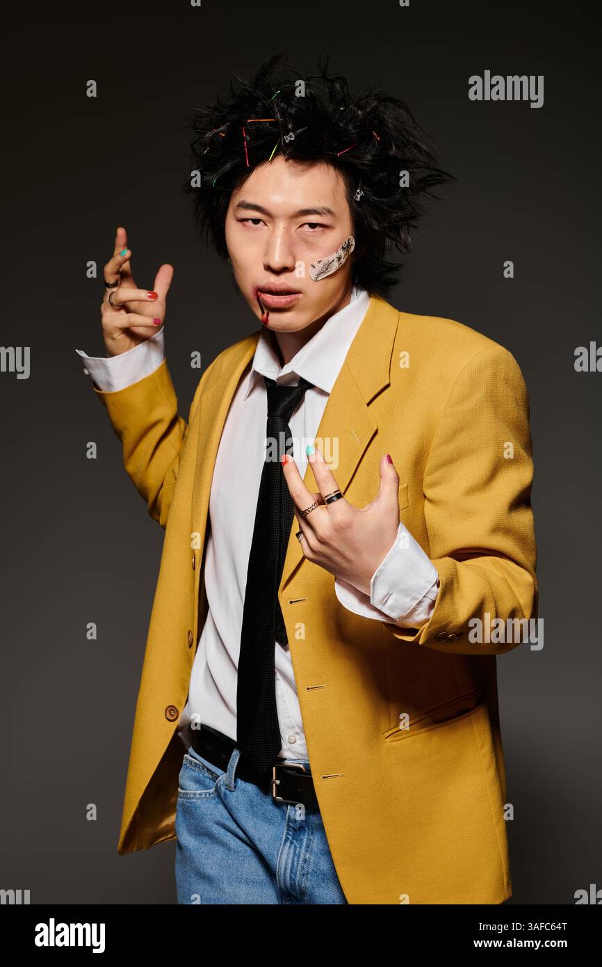 An asian man with blood on face showcases his unique spring fashion ...