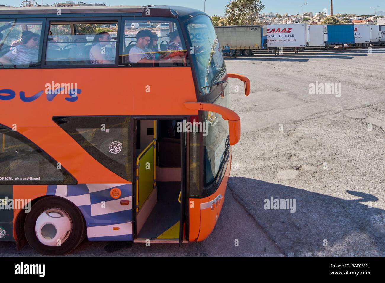 Crete, Greece - April 7, 2025: A red double-decker tourist bus labeled ...