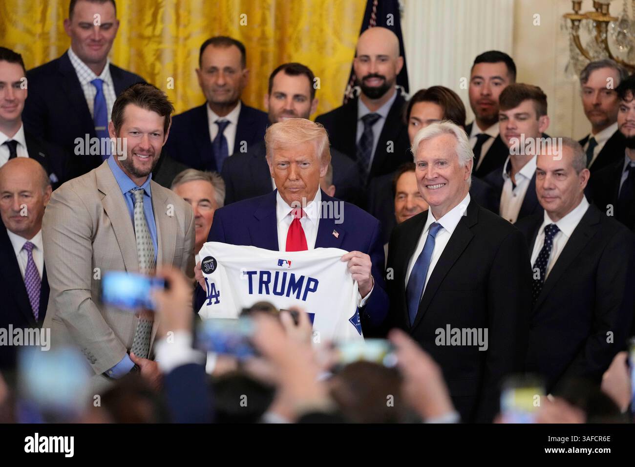 Los Angeles Dodgers' Clayton Kershaw, left, and owner Mark Walter ...