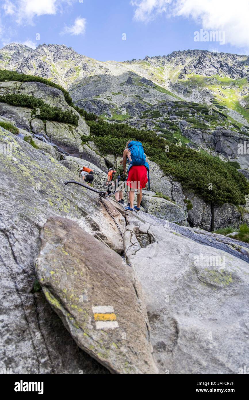 Hiker using chain climb hi-res stock photography and images - Alamy