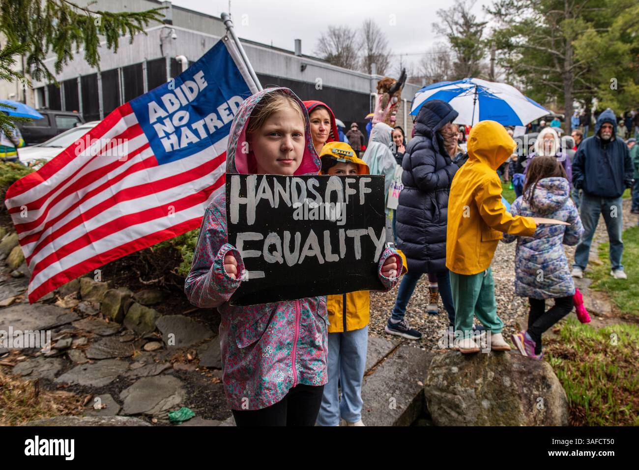 Newtown, United States. 05th Apr, 2025. A child holds a placard during ...