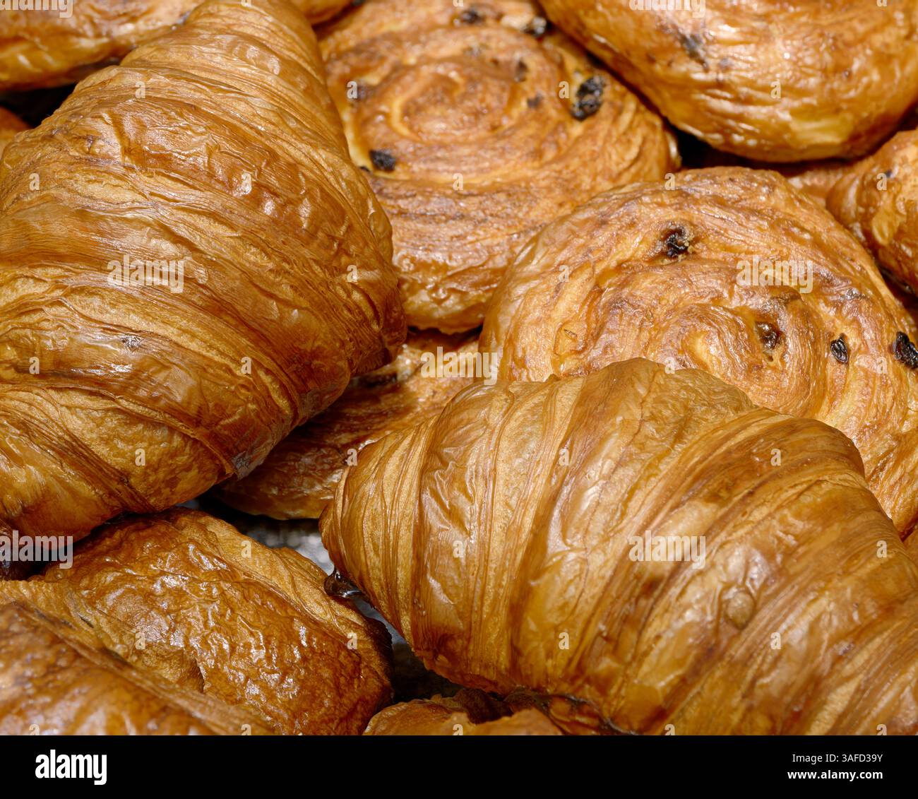 Various types of traditional pastries made from puff pastry ...