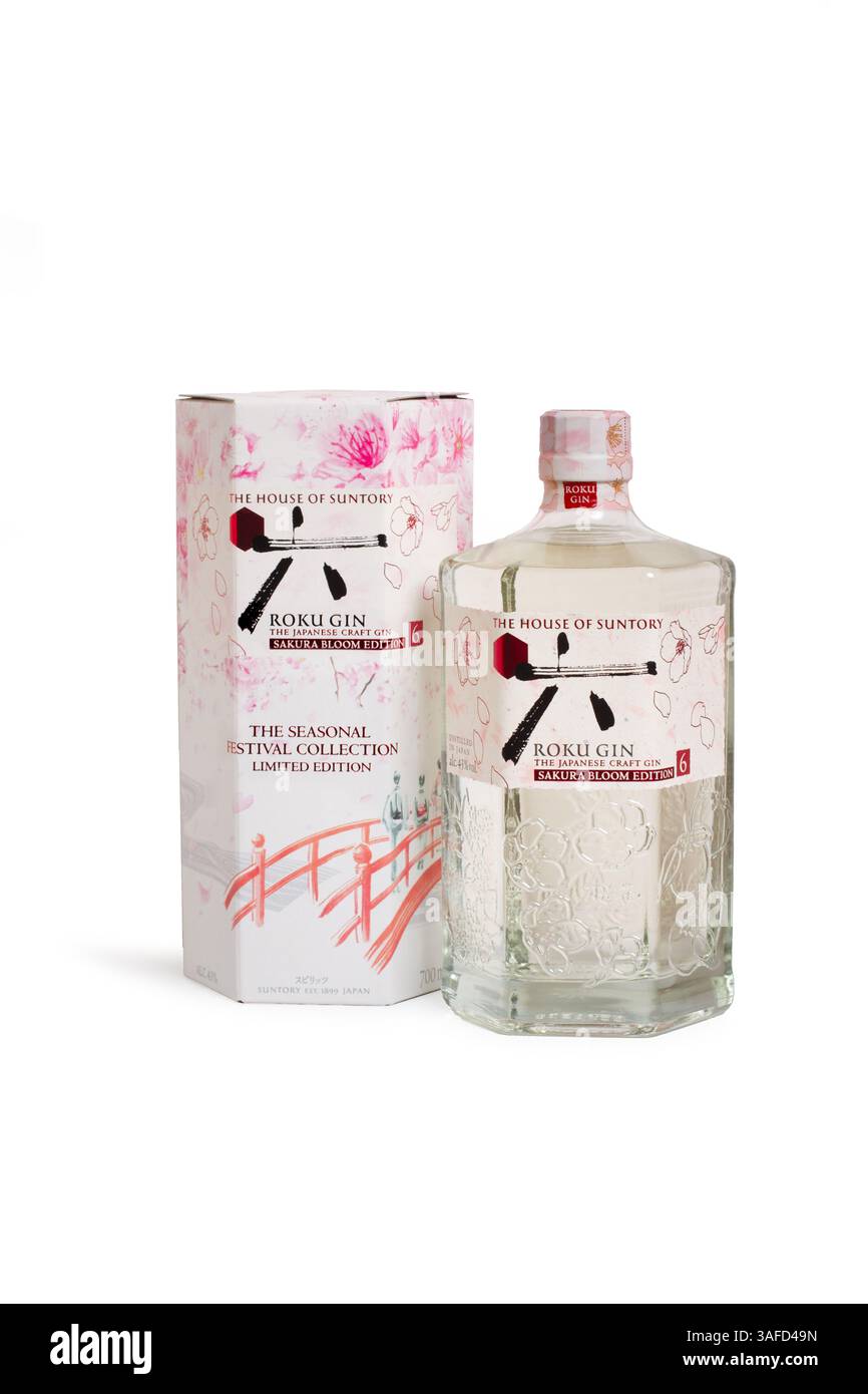 A bottle of roku gin and it box on a white background with copy space ...