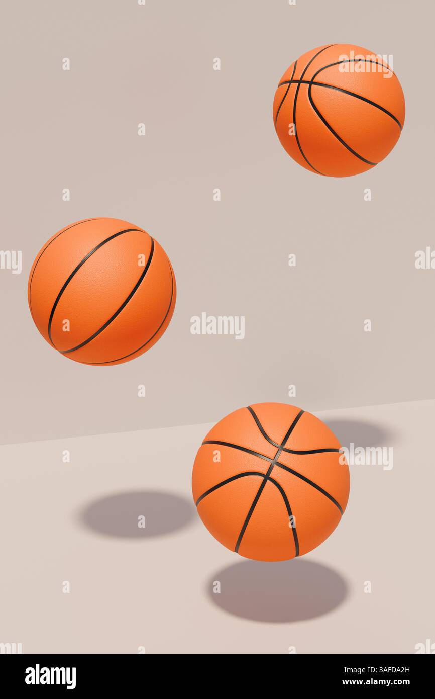 Three basketballs bouncing on a surface, showcasing dynamic movement ...