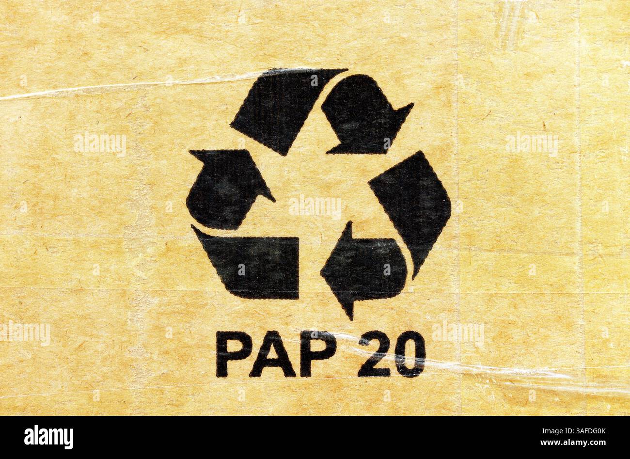 Recycling symbol with pap 20 code on brown paper background Stock Photo ...