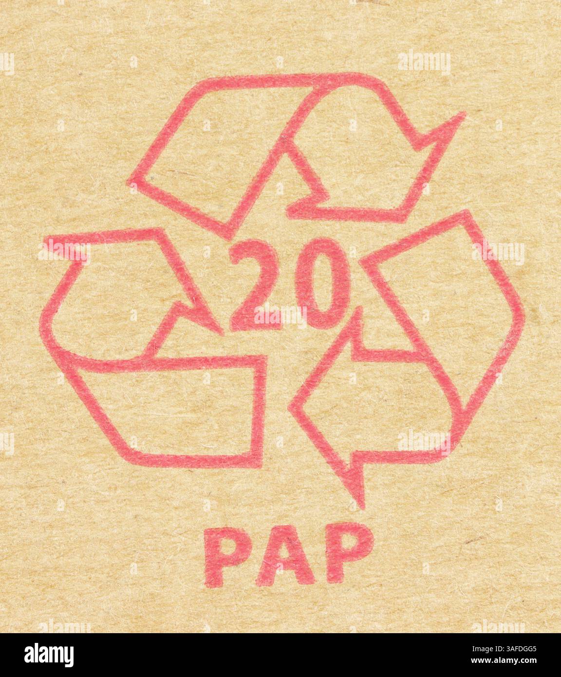 Recycling symbol with red arrows and code 20 on brown background Stock ...