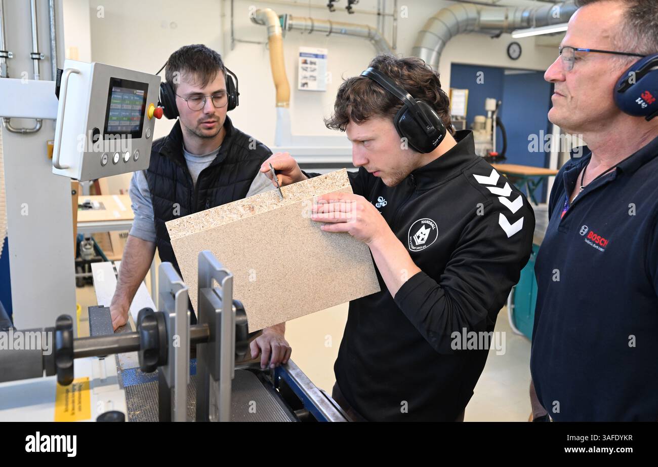 Stuttgart, Germany. 07th Apr, 2025. Trainees work on a workpiece in a ...