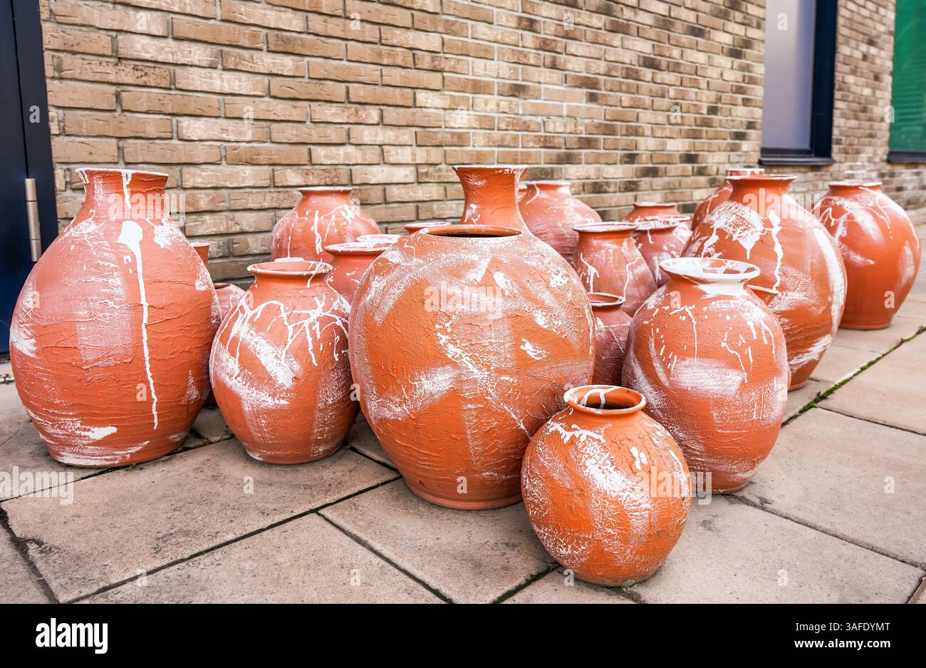 Clay jugs with modern design in different sizes and shapes. Craft Stock ...