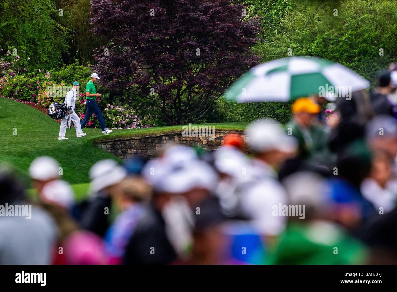 Ludvig Åberg of, Sweden. , . with caddie Joe Skovron during practice ...