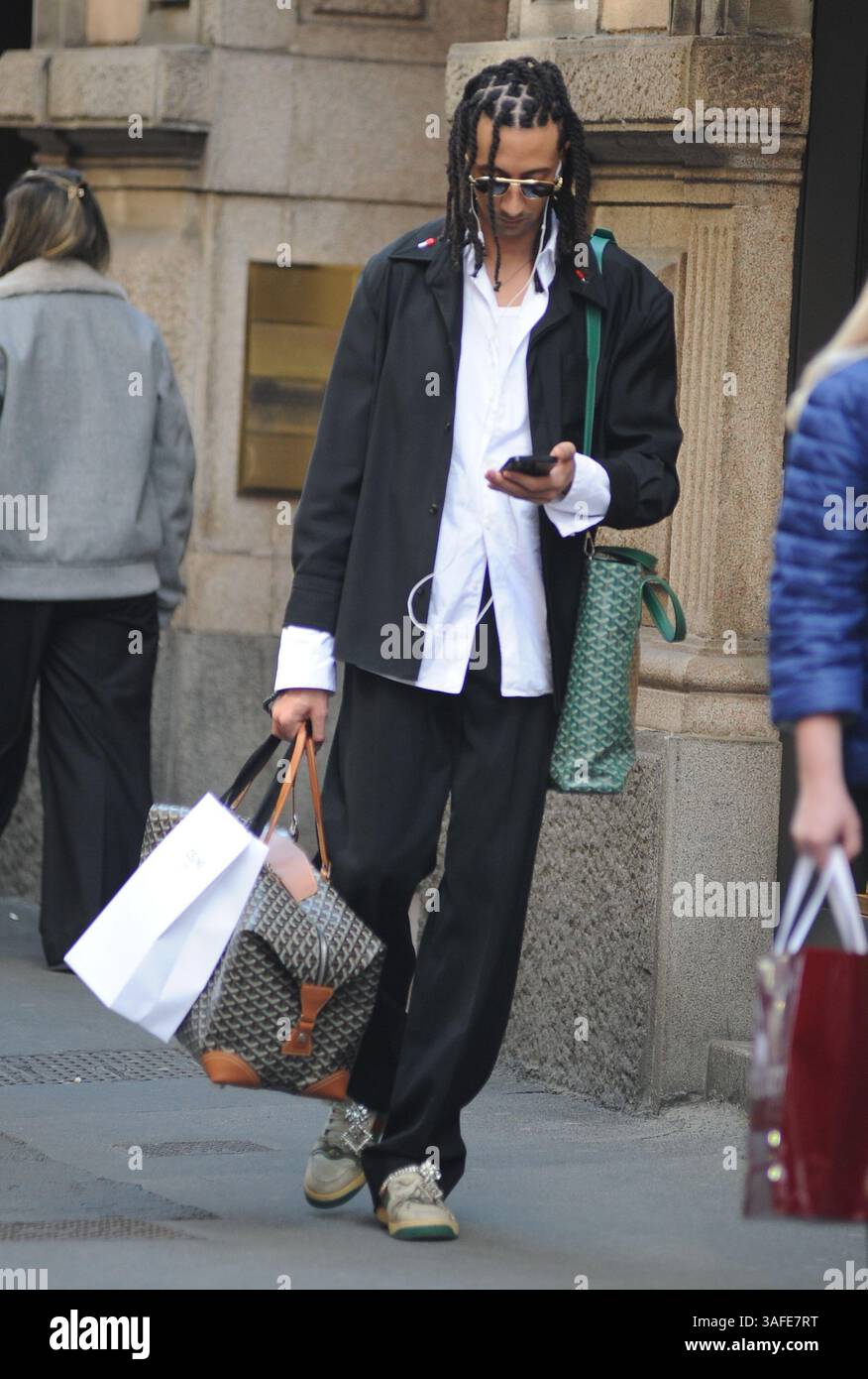 Milan, Ghali arrives downtown and enters the CELINE boutique to do some ...