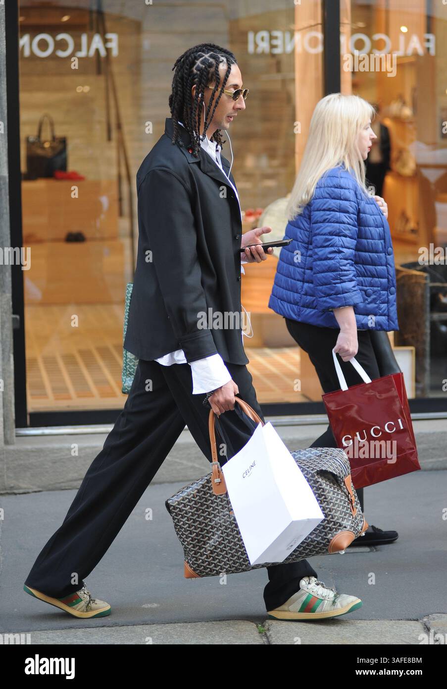 Milan, Ghali arrives downtown and enters the CELINE boutique to do some ...