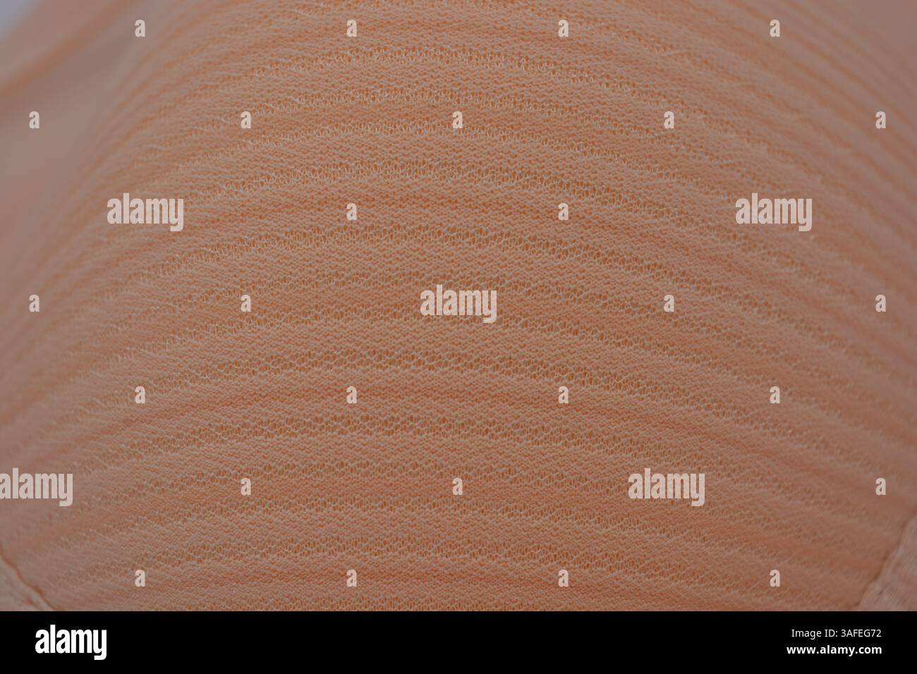 Materials, fabric background, mesh fabric made of synthetic fibers in ...