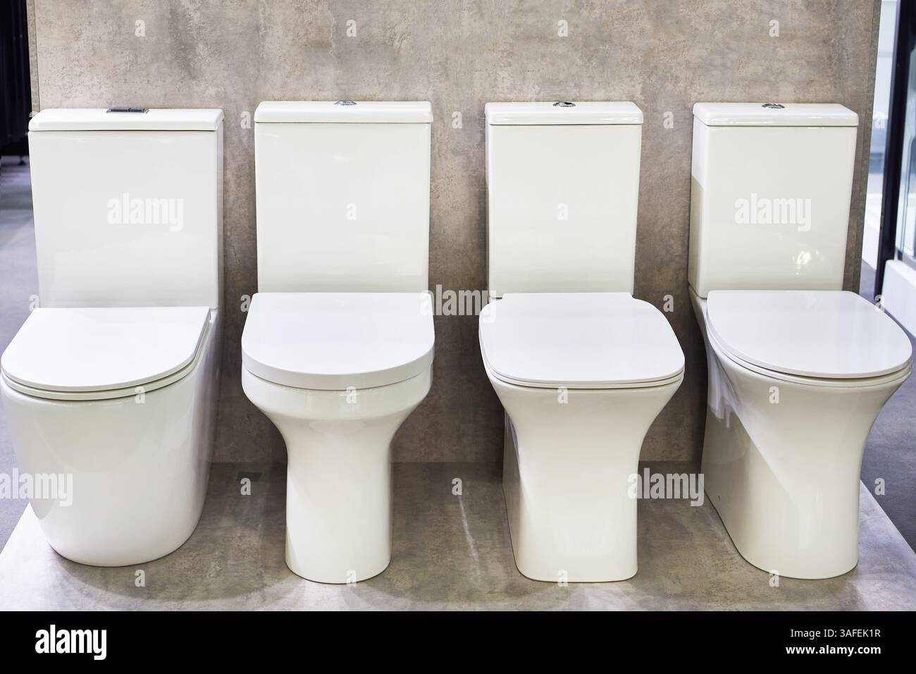 Toilet bowls in the sanitary ware shop Stock Photo - Alamy
