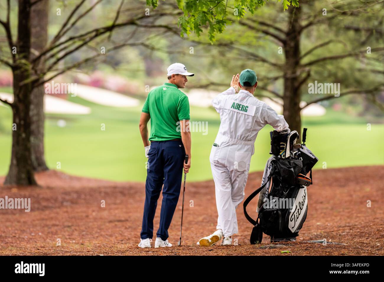Ludvig Åberg of, Sweden. , . with caddie Joe Skovron during a practice ...